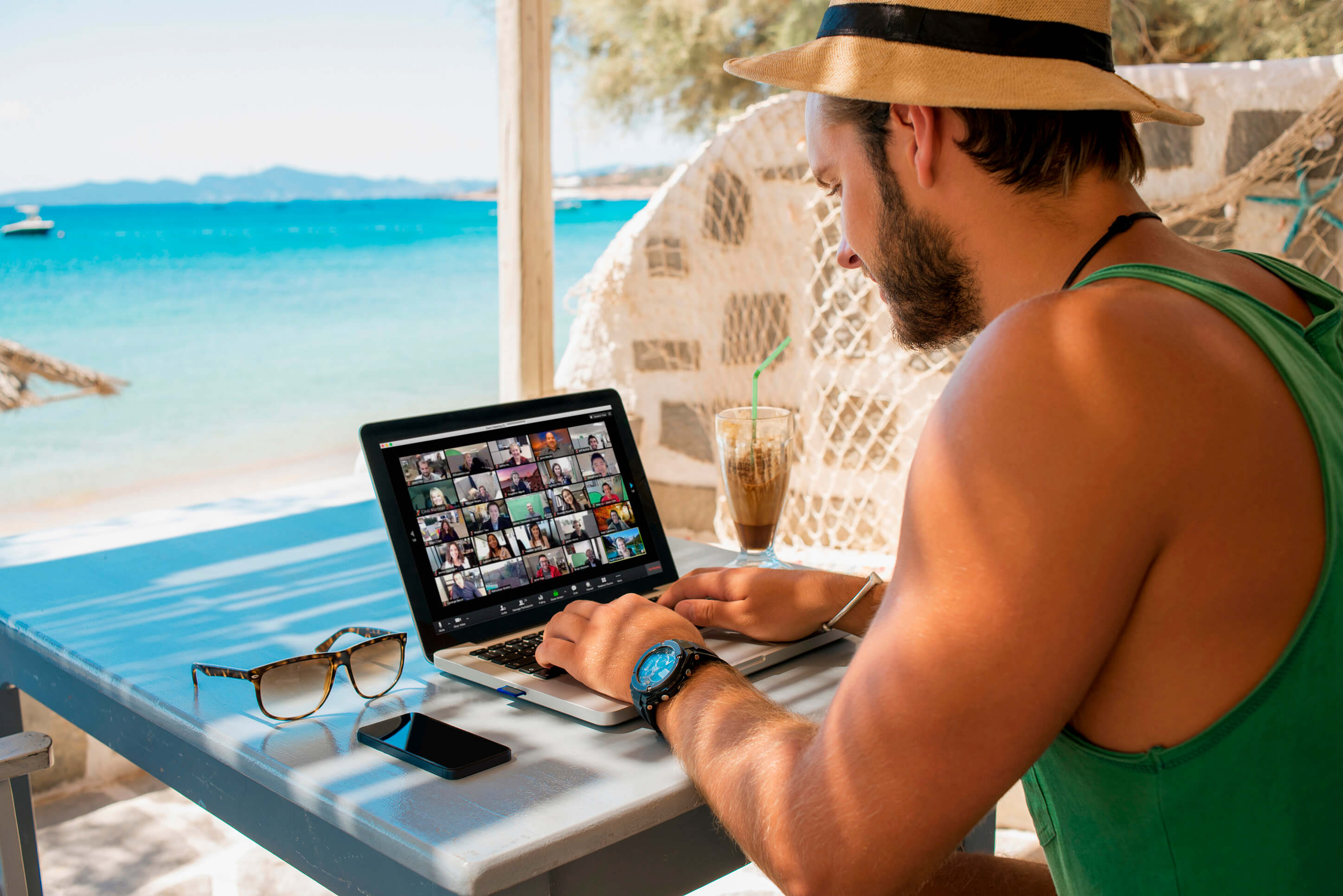 relaxing and working on the beach - Nichols College